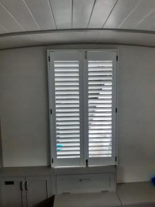 The ultimate window dressing for a stunning houseboat interior